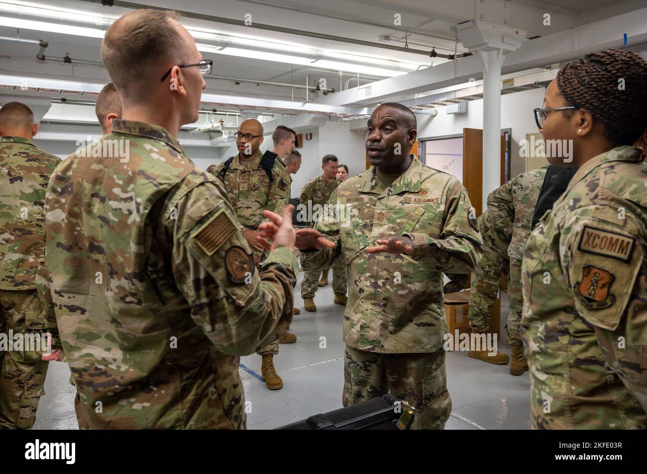 U.S. Air Force Chief Master Sgt. Maurice Williams, center, command ...