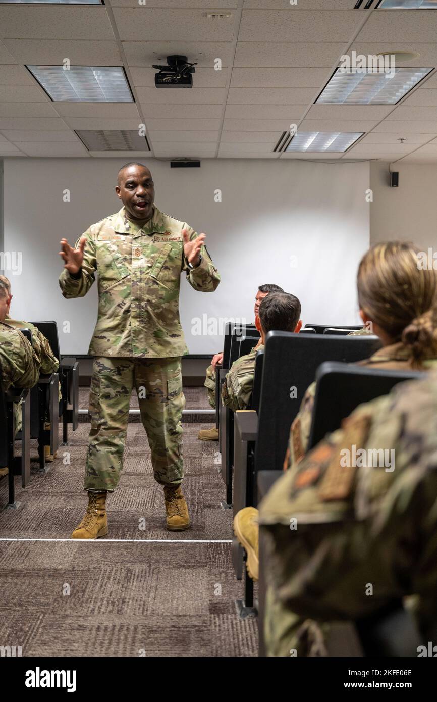 U.S. Air Force Chief Master Sgt. Maurice Williams, center, command ...