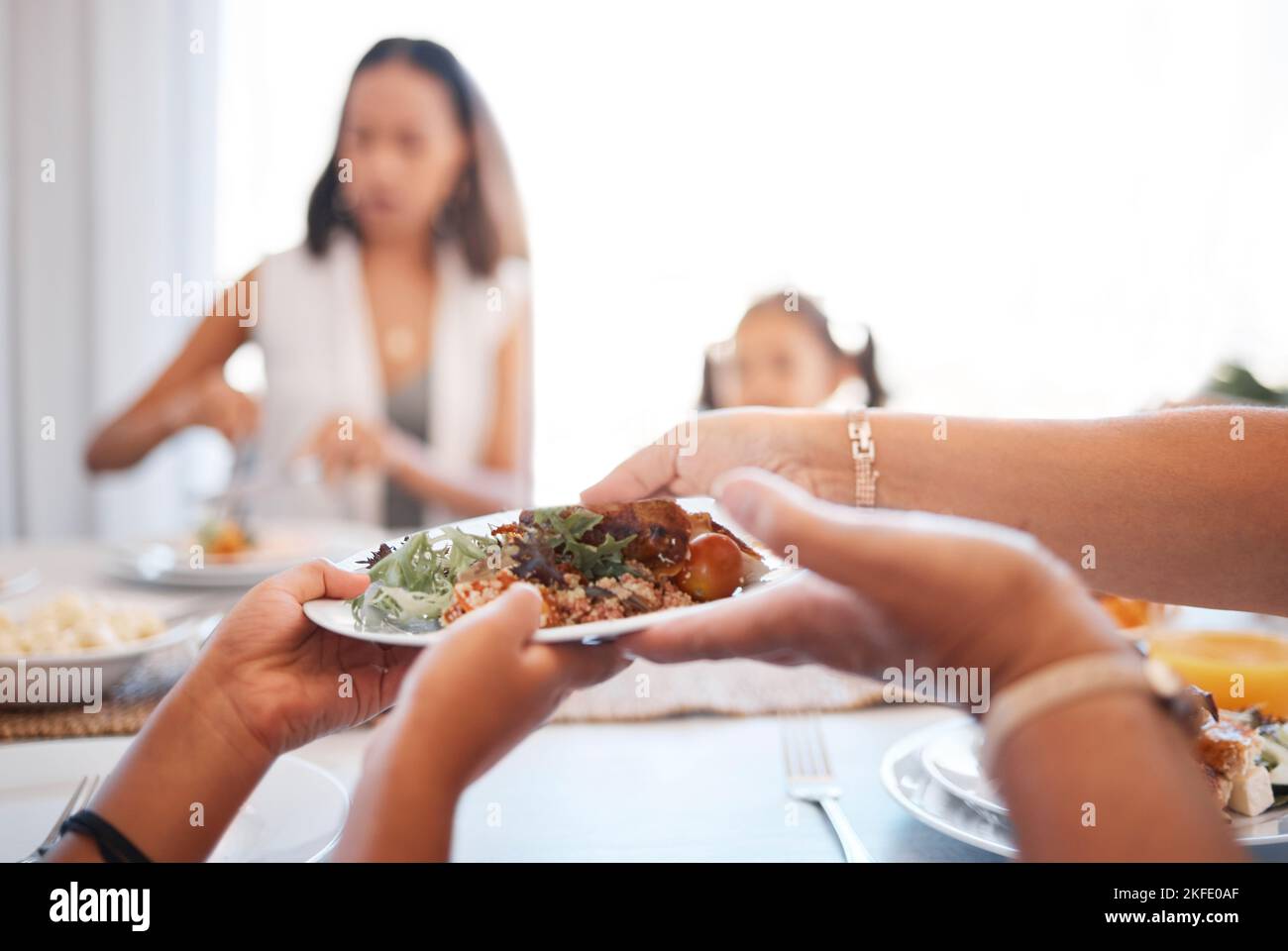 People sitting dining table hi-res stock photography and images - Alamy