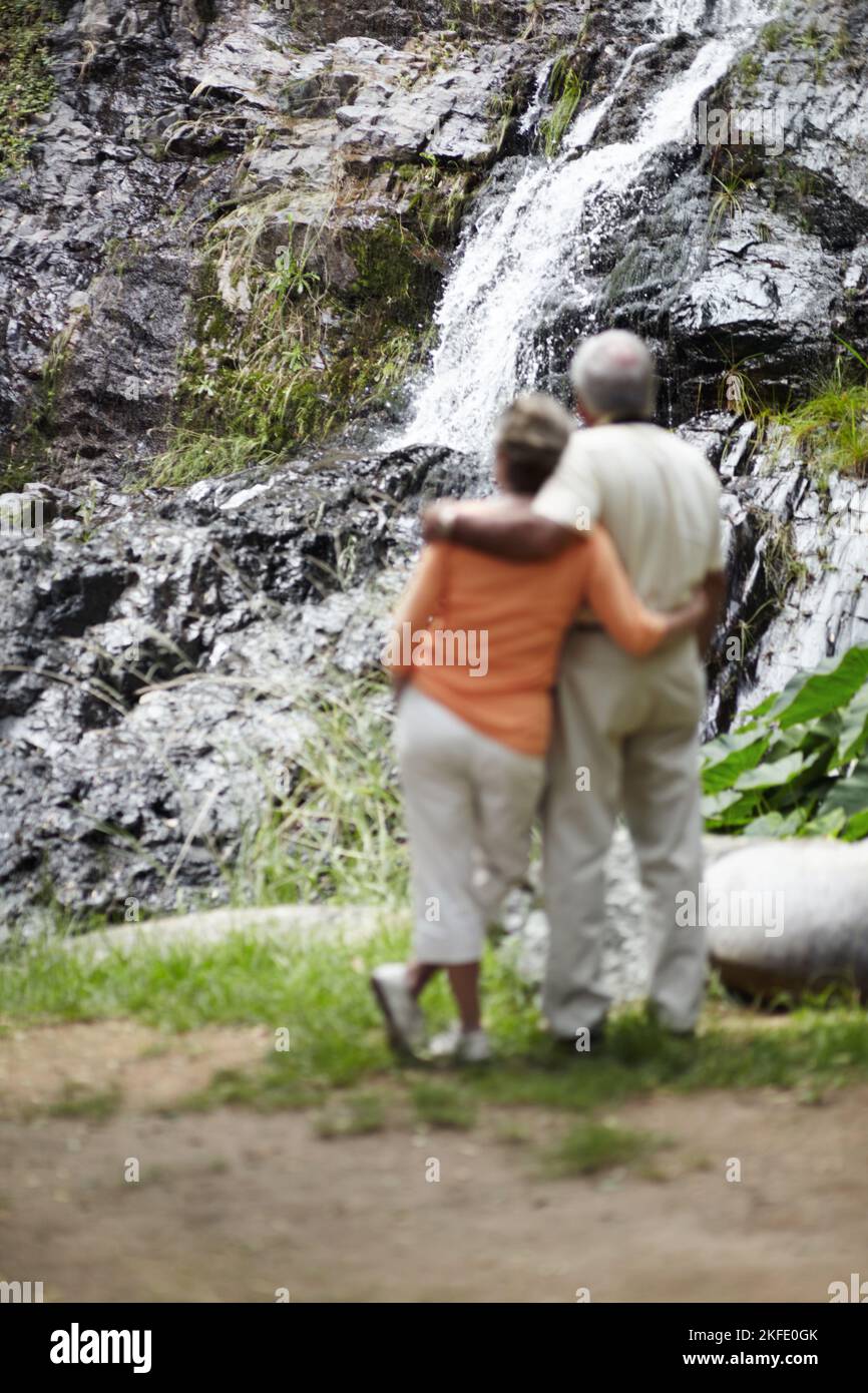 Simply breathtaking. Rear view of a senior couple embracing and ...