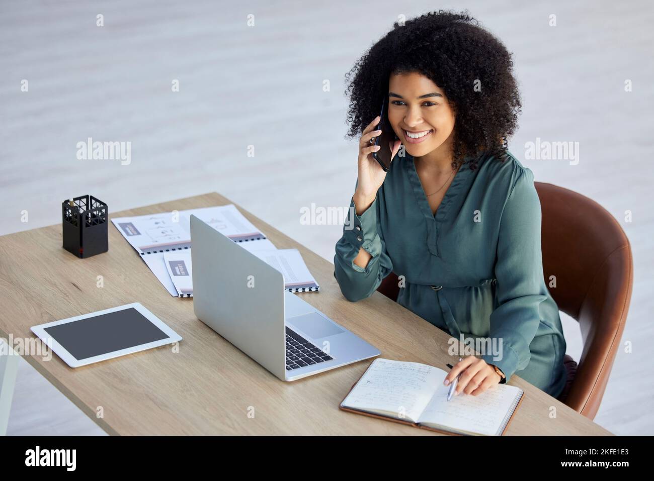Phone call, notebook and laptop with business woman for planning ...
