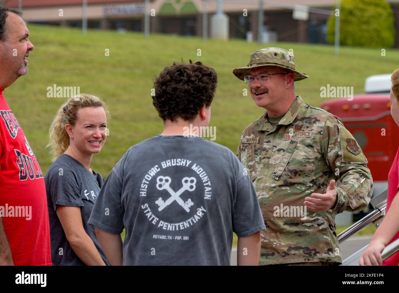 Master Sgt. David Mayes chats with guests waiting to board a KC-135 ...