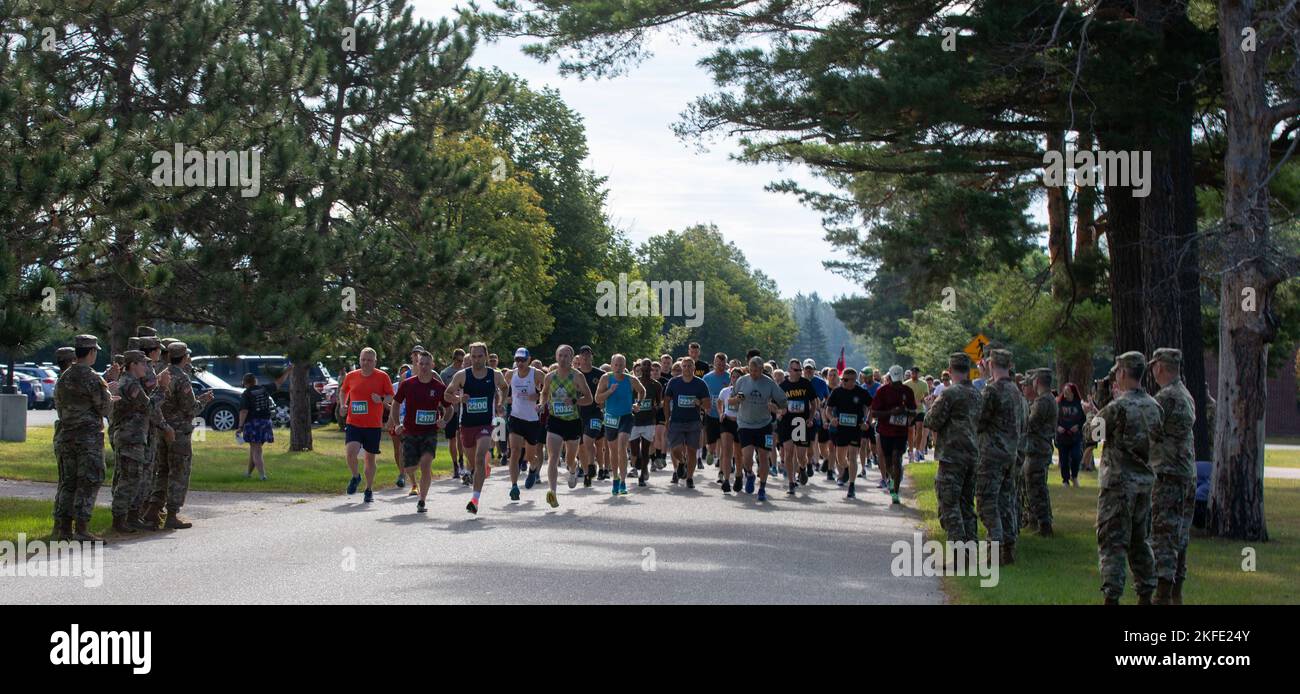 Participants of the annual Vermont Remembers Run line up at the start ...