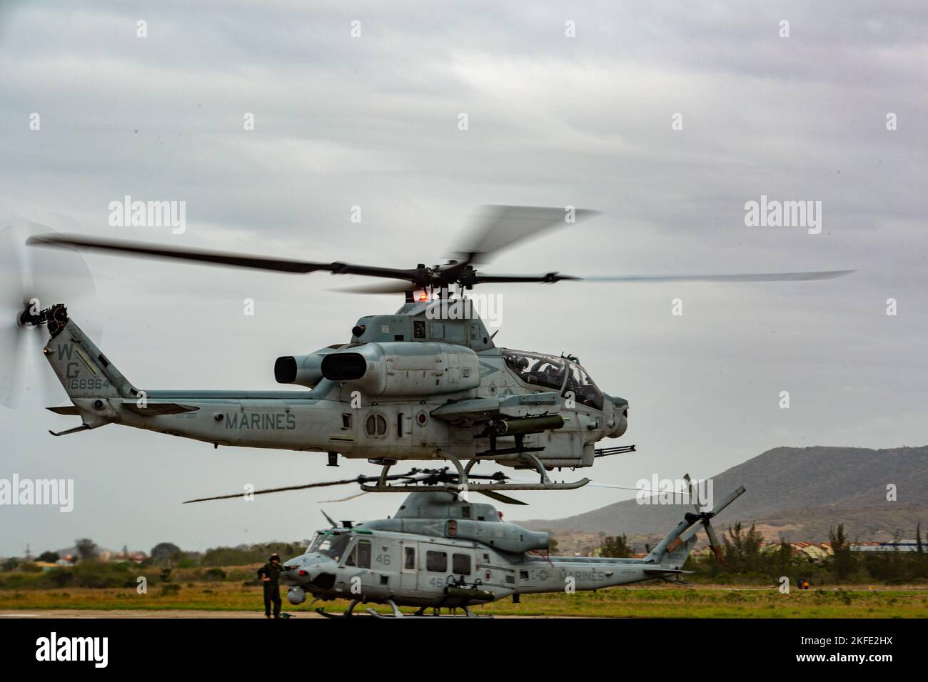 An AH-1Z Viper attack helicopter with Marine Light Attack Helicopter ...