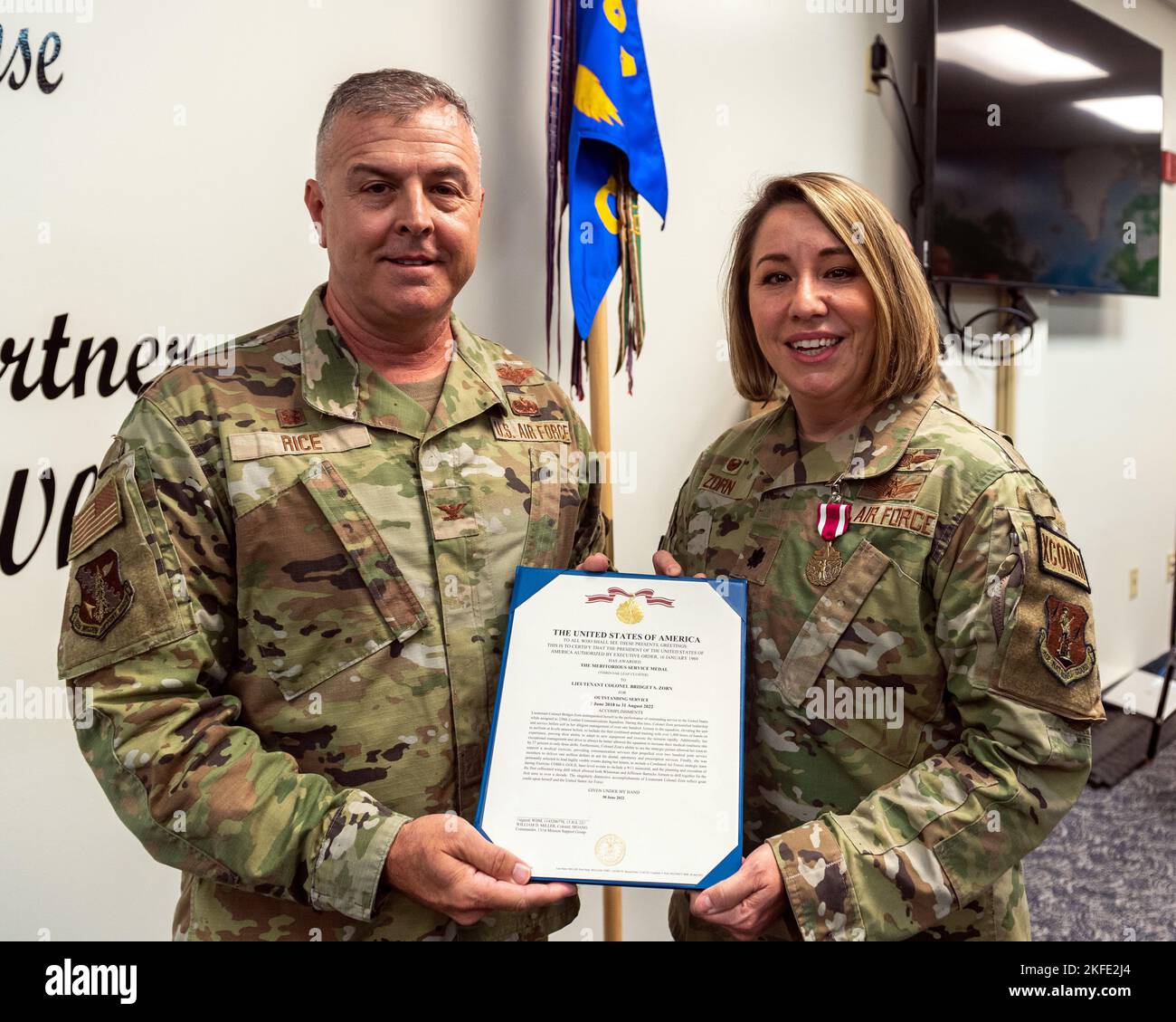 U.S. Air Force Lt. Col. Bridget Zorn, right, the incoming commander of ...