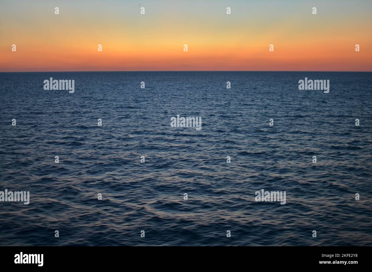 Sun is gone Dawn at Sea colorfull Ocean Horizon Stock Photo - Alamy
