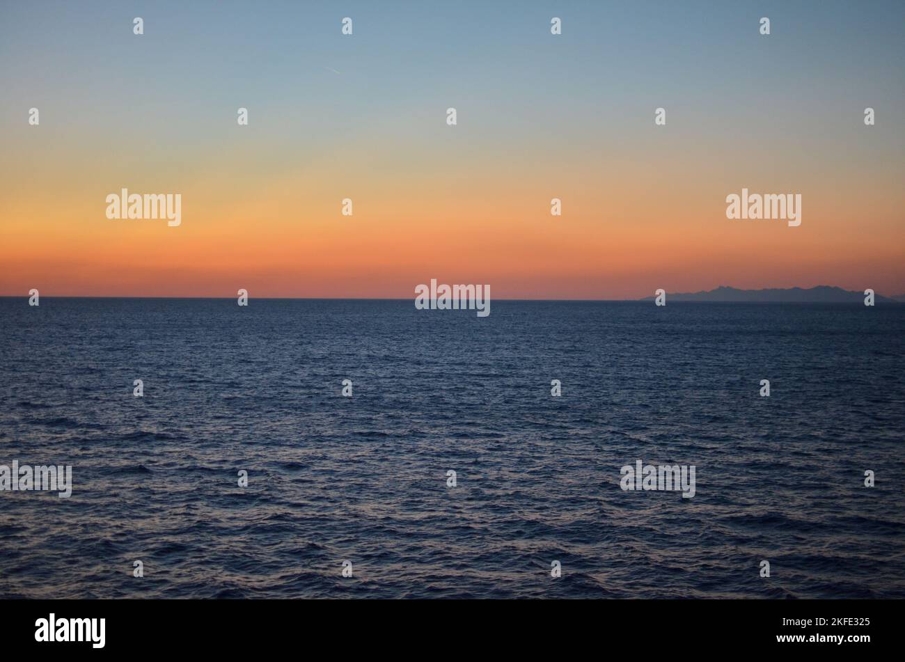 Sun is gone Dawn at Sea colorfull Ocean Horizon Stock Photo - Alamy