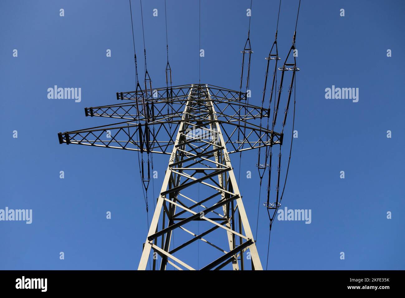 Electric wire tower metal support on the sky background. Electric ...