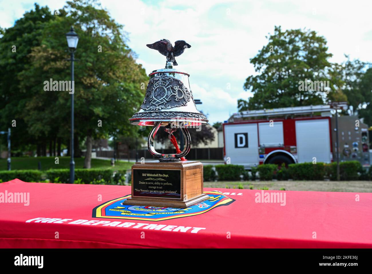 The Royal Air Force Mildenhall Fire Department bell sits on a table ...