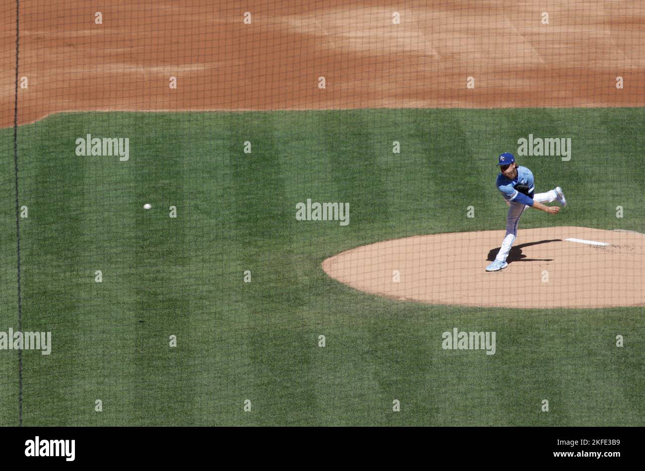 A Kansas City Royals pitcher throws the game's first ball at Kauffman ...