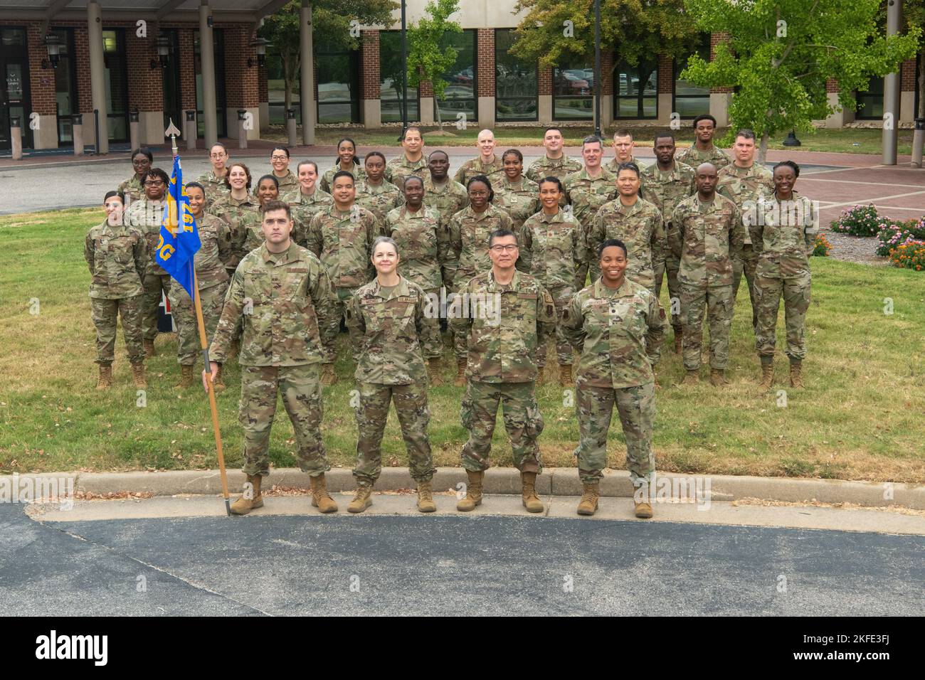 Airmen assigned to the 192nd Medical Group stand for a group photo ...