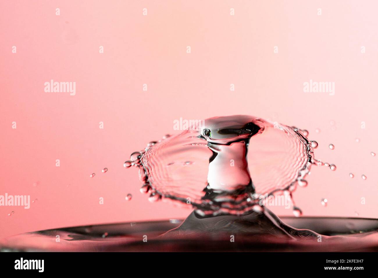 Water Drop with Ripples on water surface Stock Photo - Alamy