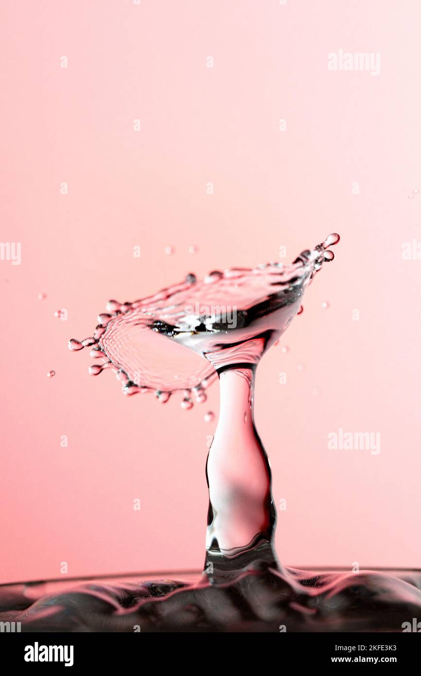 Water Drop with Ripples on water surface Stock Photo - Alamy