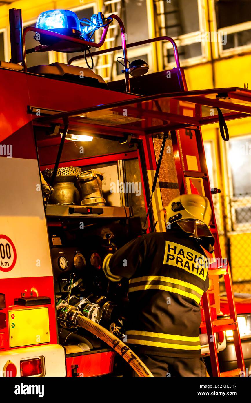 fireman during extinguishing of the fire Stock Photo - Alamy