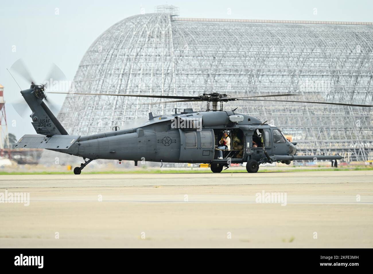 Military spouse Cheryl Mercado sits in the rear passenger seat of an HH ...
