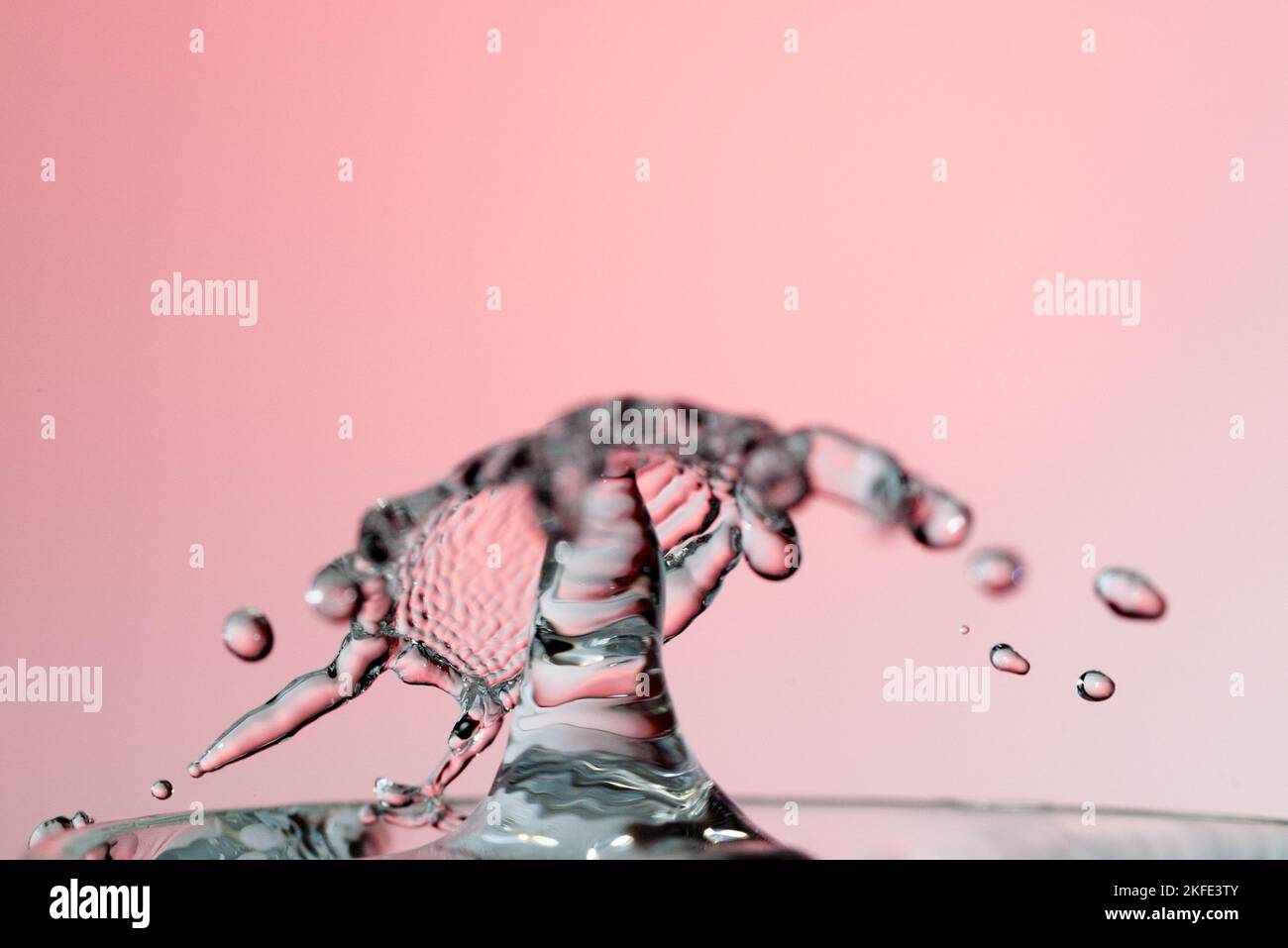 Water Drop with Ripples on water surface Stock Photo - Alamy