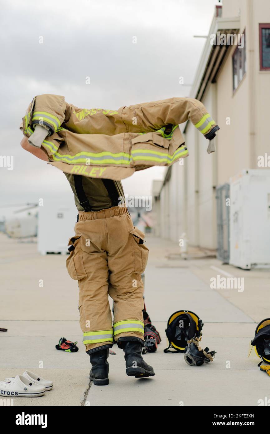 U.S. Marine Corps Cpl. Kevin Riley, a firefighter with Aircraft Rescue ...