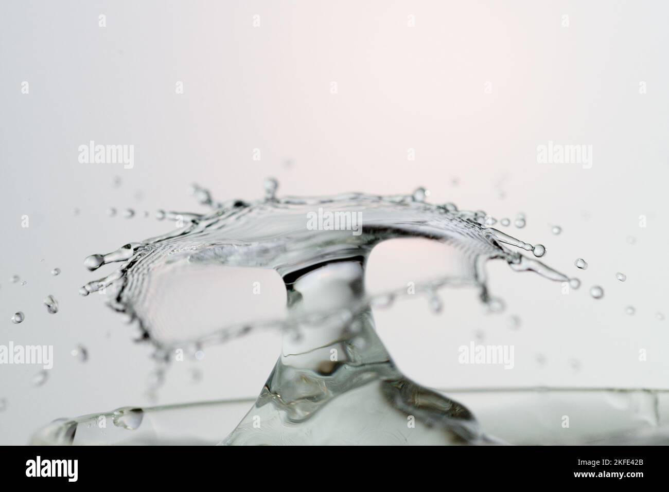 Water Drop with Ripples on water surface Stock Photo - Alamy