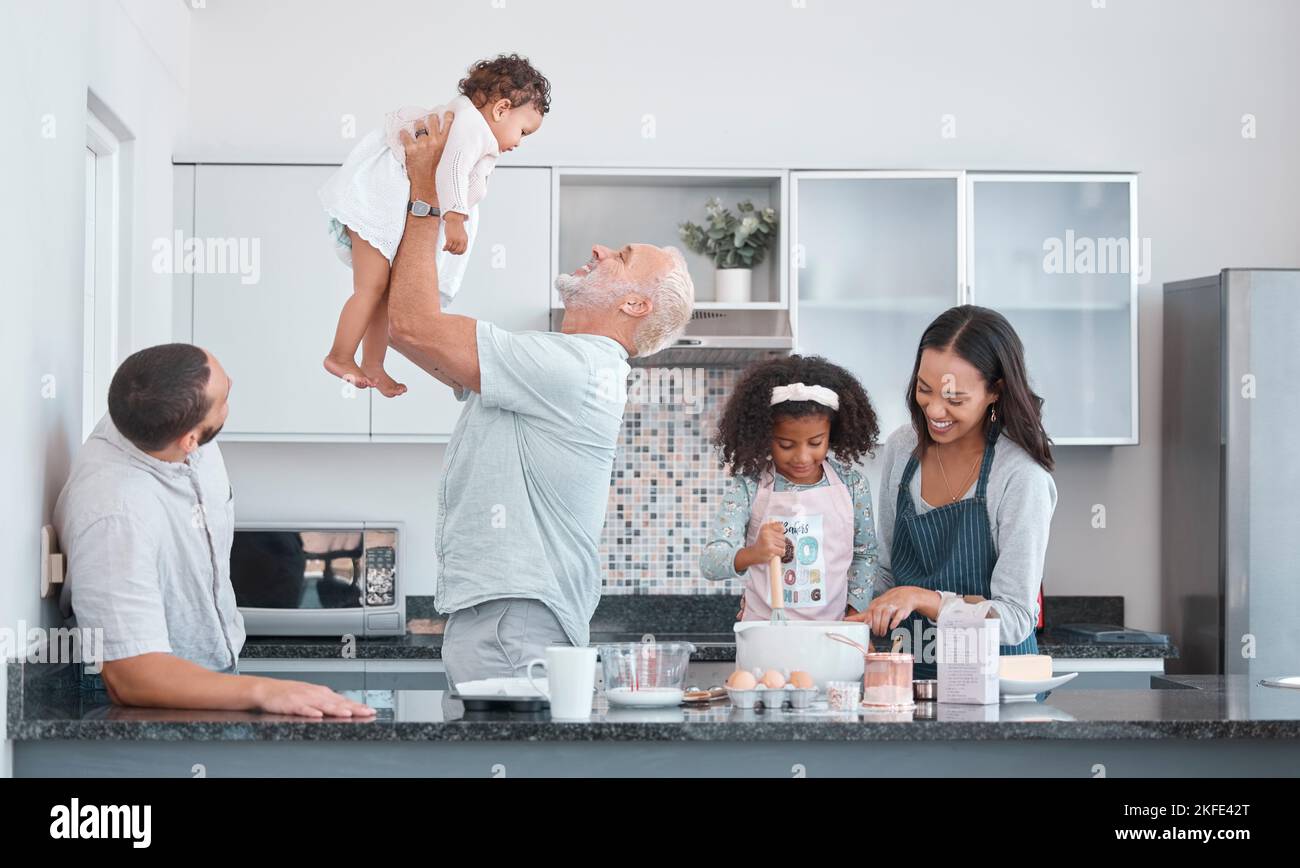Family, children and baking with a senior man bonding with his ...