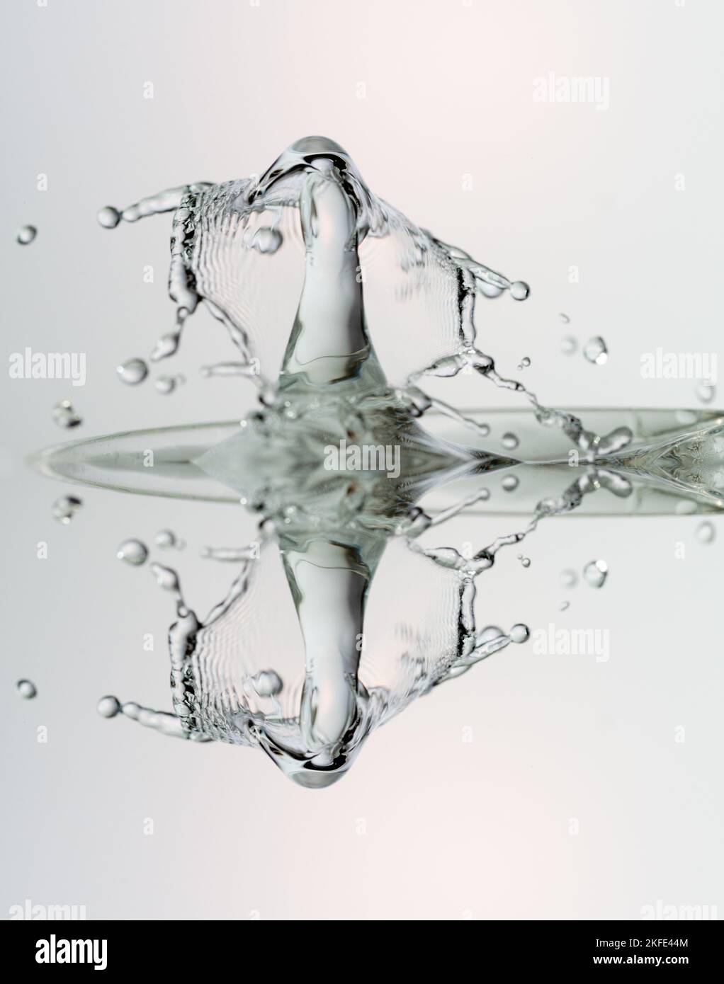 Water Drop with Ripples on water surface Stock Photo - Alamy