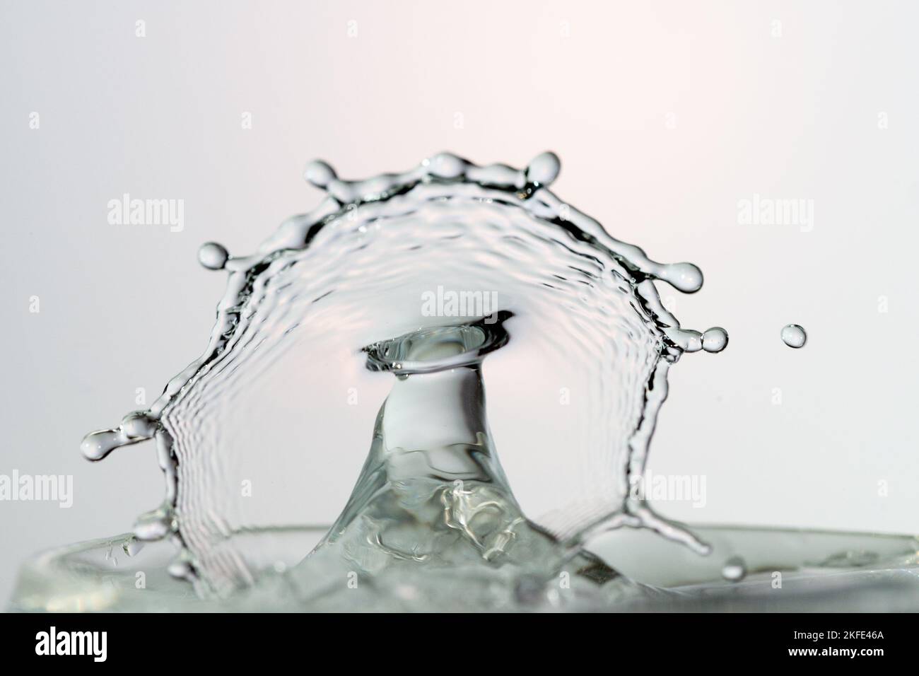 Water Drop with Ripples on water surface Stock Photo - Alamy
