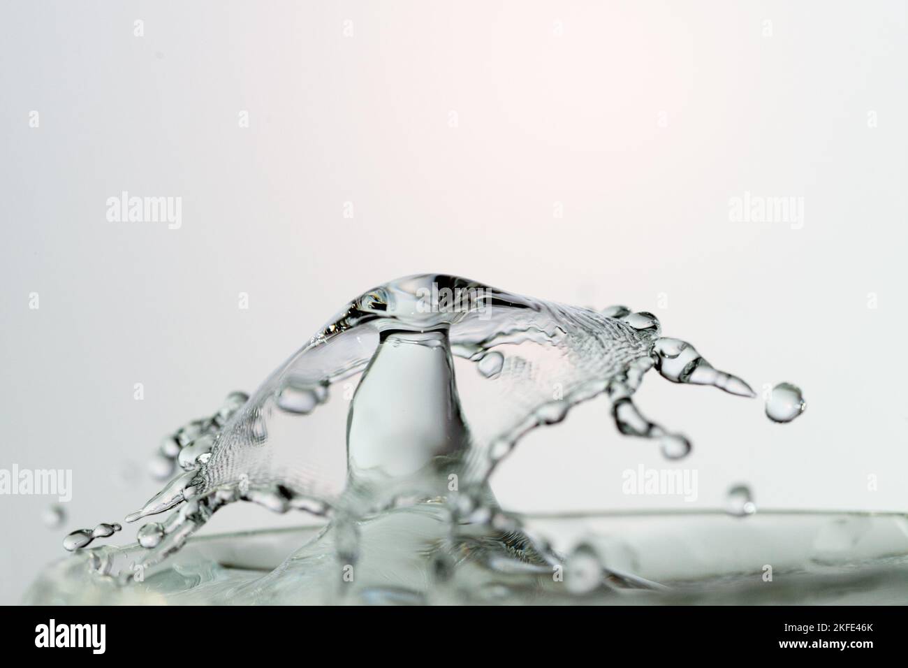 Water Drop with Ripples on water surface Stock Photo - Alamy