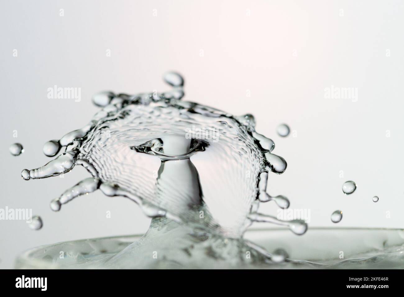 Water Drop with Ripples on water surface Stock Photo - Alamy