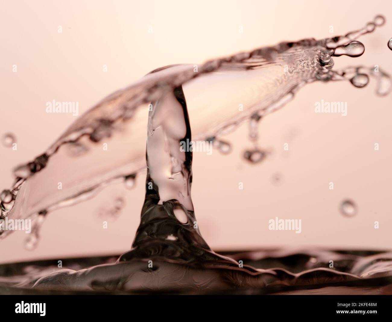 Water Drop with Ripples on water surface Stock Photo - Alamy