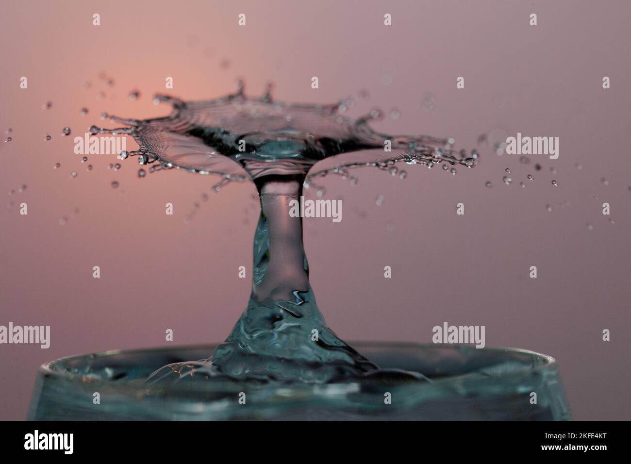 Water Drop with Ripples on water surface Stock Photo - Alamy
