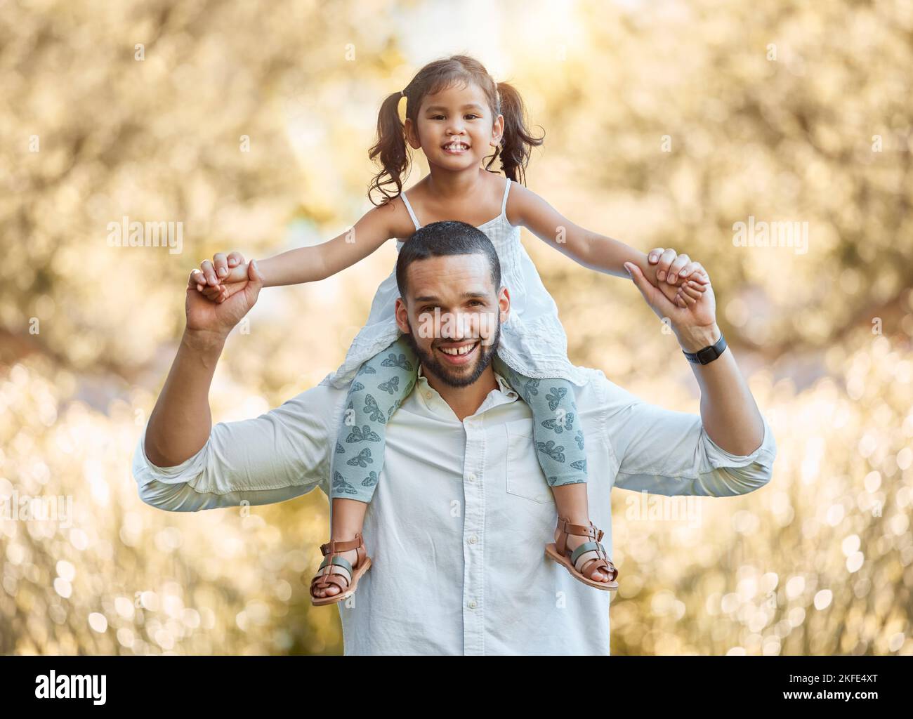 Portrait of dad, child and holding hands on shoulder while bonding in ...