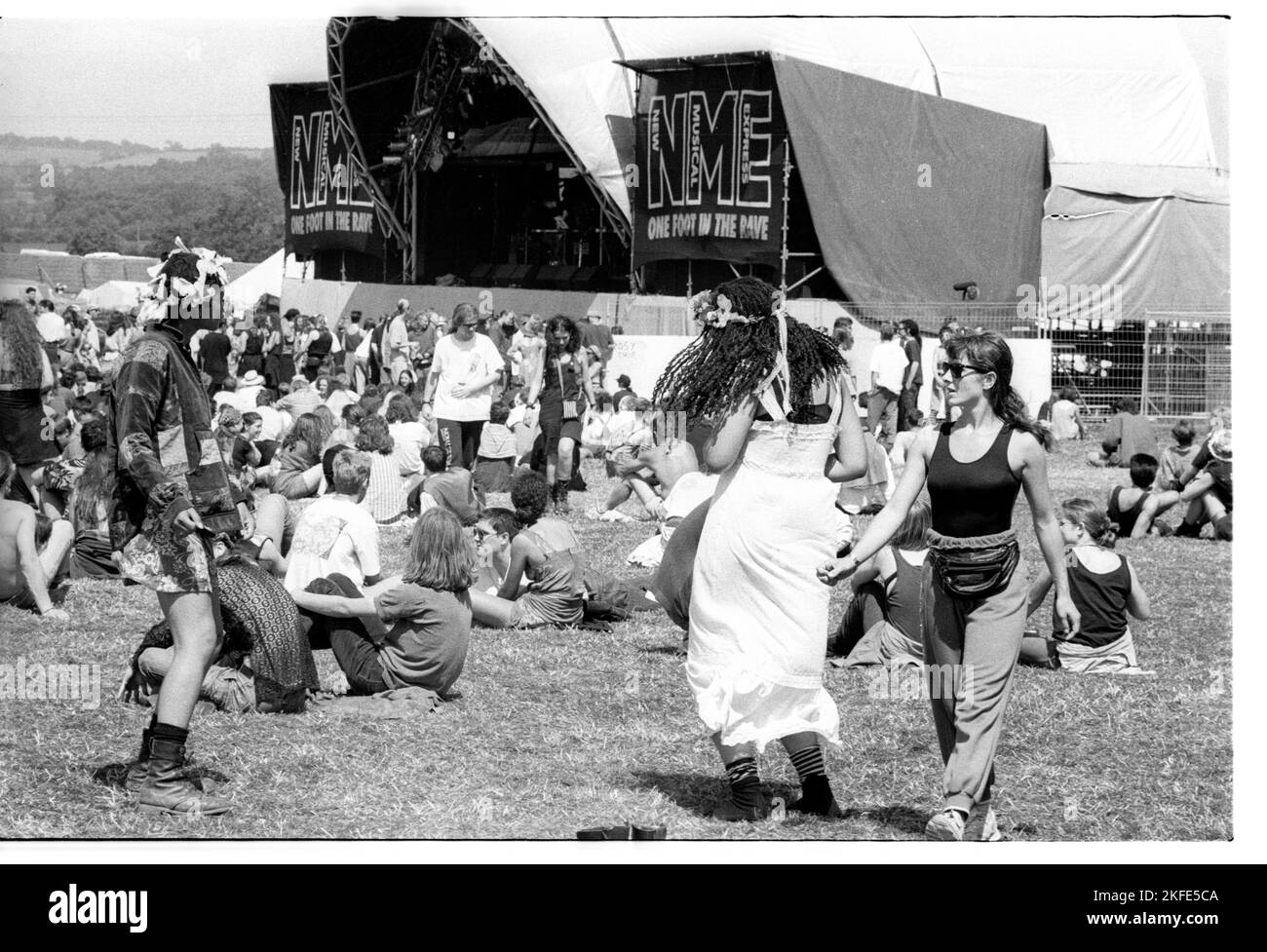 Dancing with long dreadlocks dreads in the heat at the NME Stage crowd ...