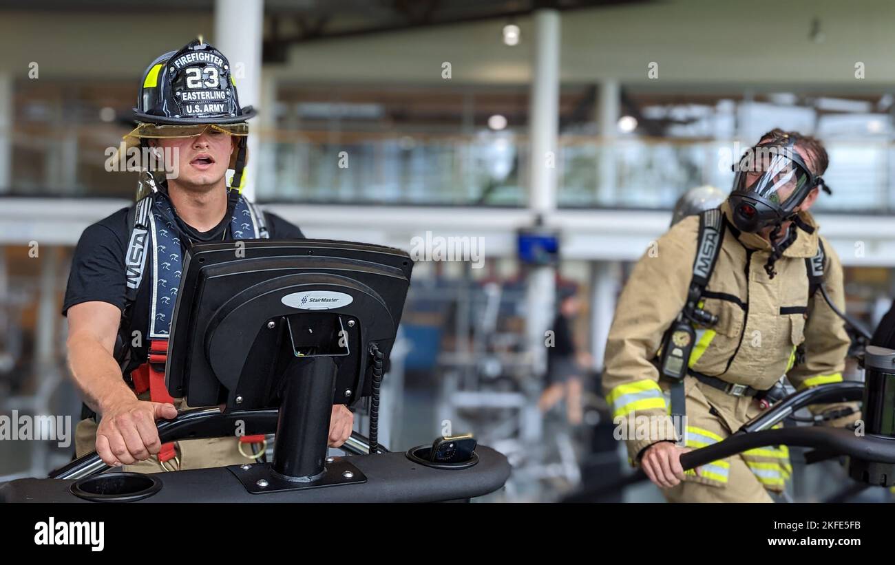 U.S. Army Pfc. Mason Easterling, a firefighter, and 1st Sgt. Thomas ...