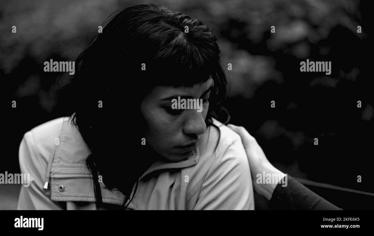 Two women hugging sad Black and White Stock Photos & Images - Alamy