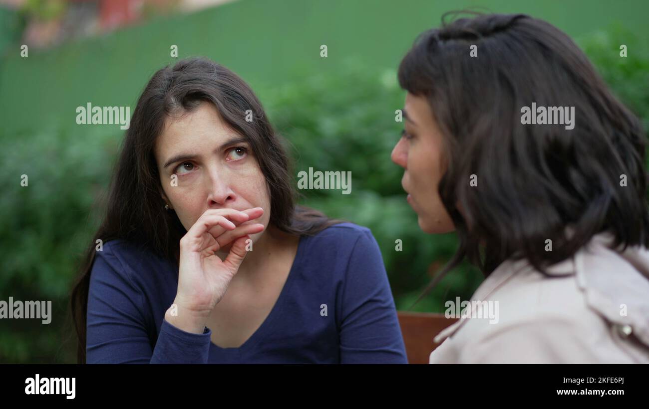 Depressed woman suffering with the help and support of female friend ...