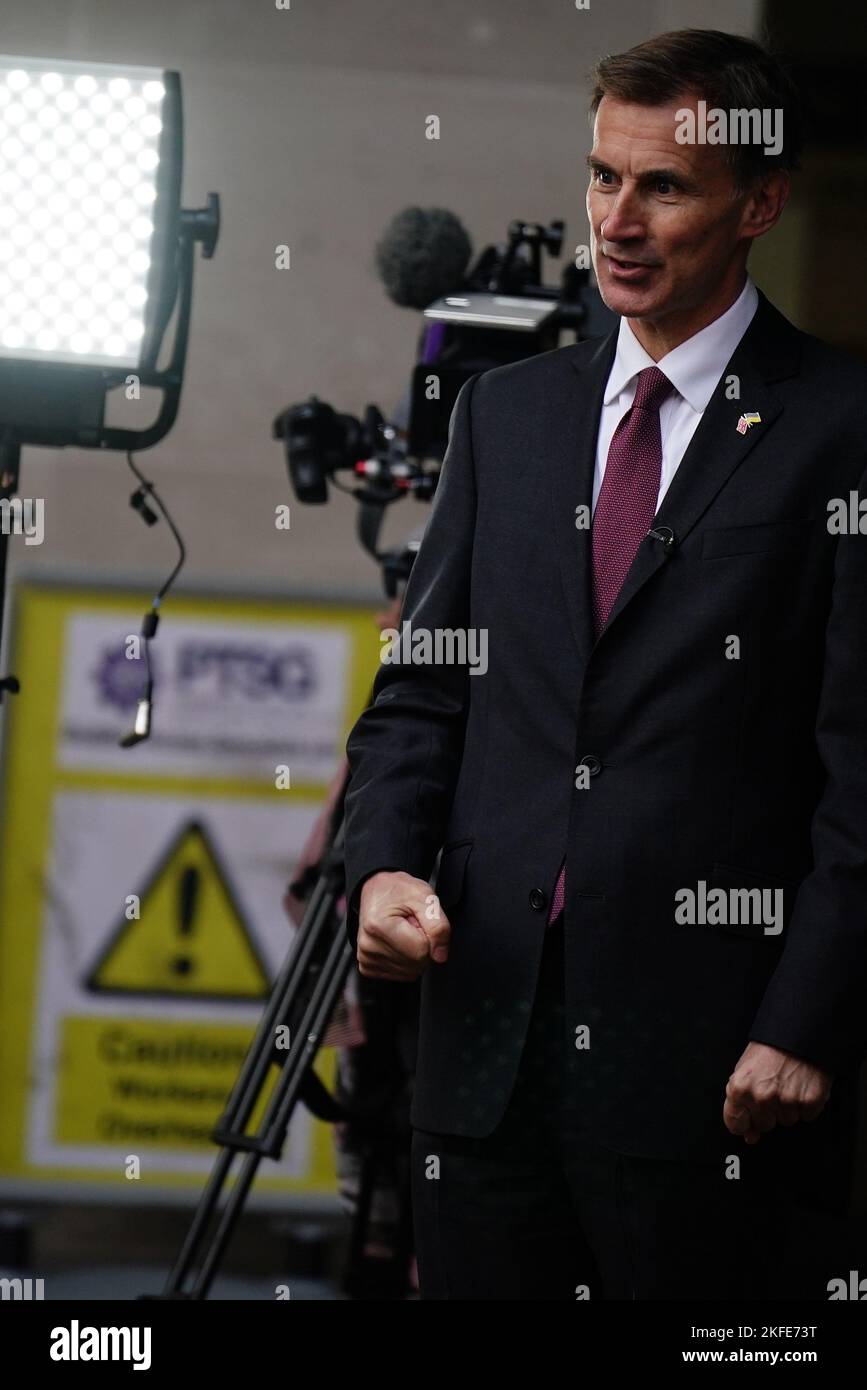 Chancellor of the Exchequer Jeremy Hunt gives a television interview ...