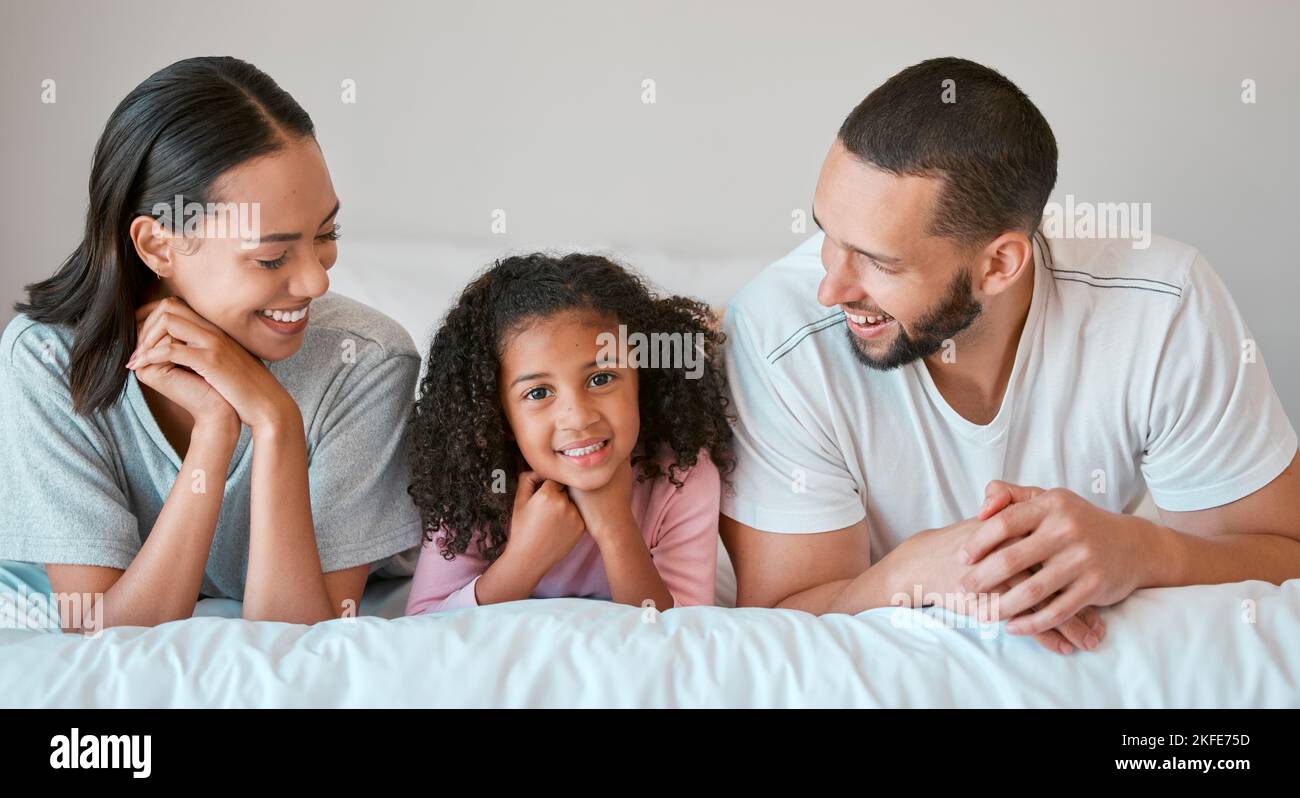 Family, portrait and home with a parents relax and resting with their ...