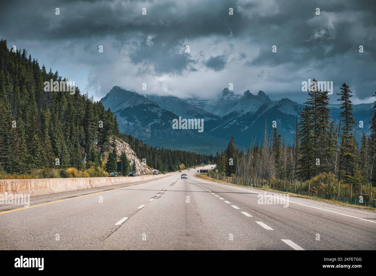 Scenic road on highway and moody sky in Canadian Rockies at Banff ...