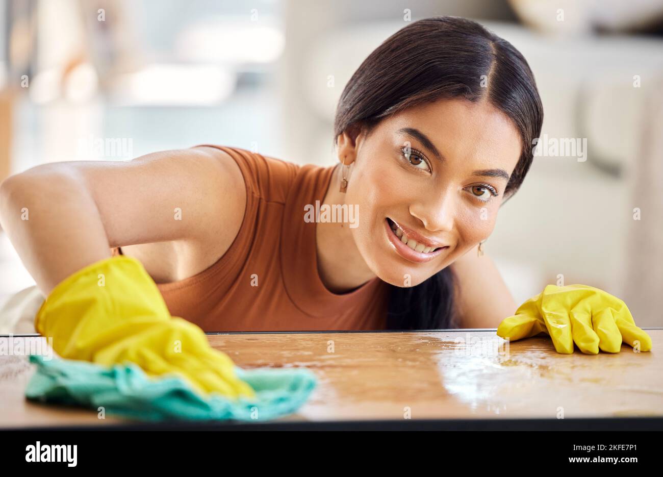 Smile, cleaning and fabric with portrait of woman and table for hygiene ...