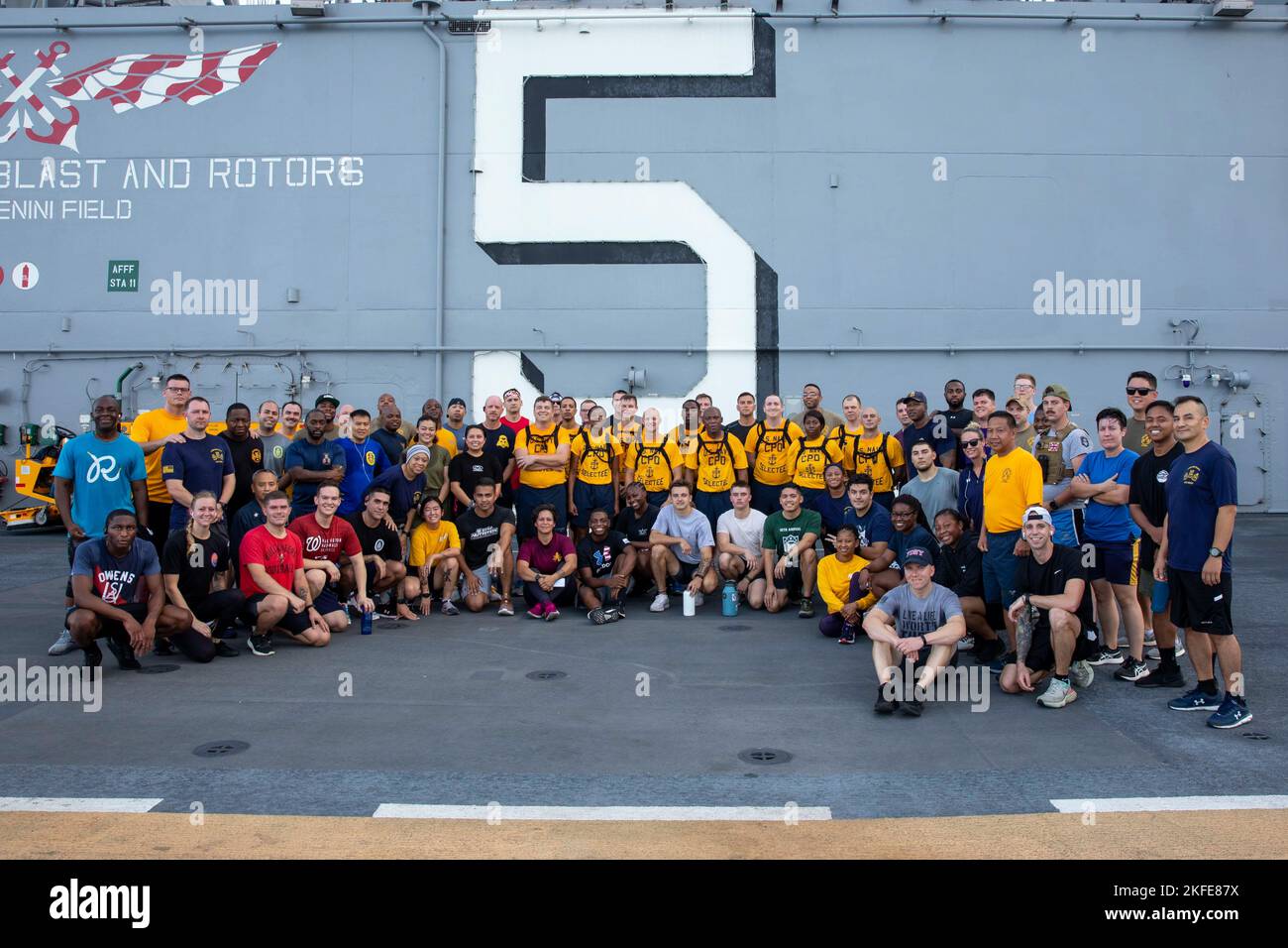 220911-N-VO895-1346 ATLANTIC OCEAN (Sept. 11, 2002) Sailors and Marines ...