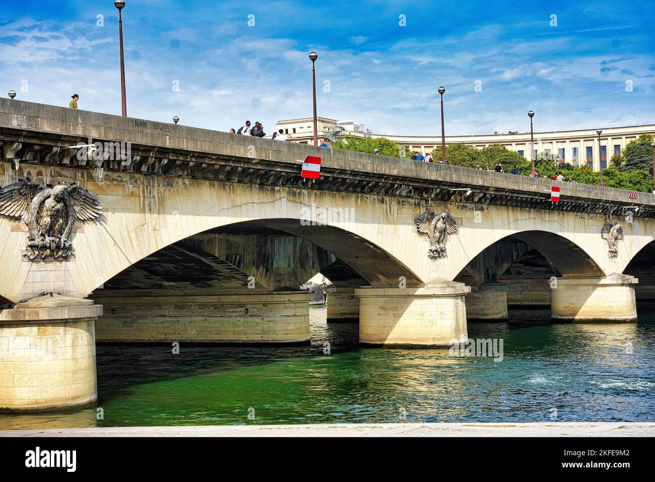 The ancient Pont Alexandre III deck arch bridge spanning the Seine in ...