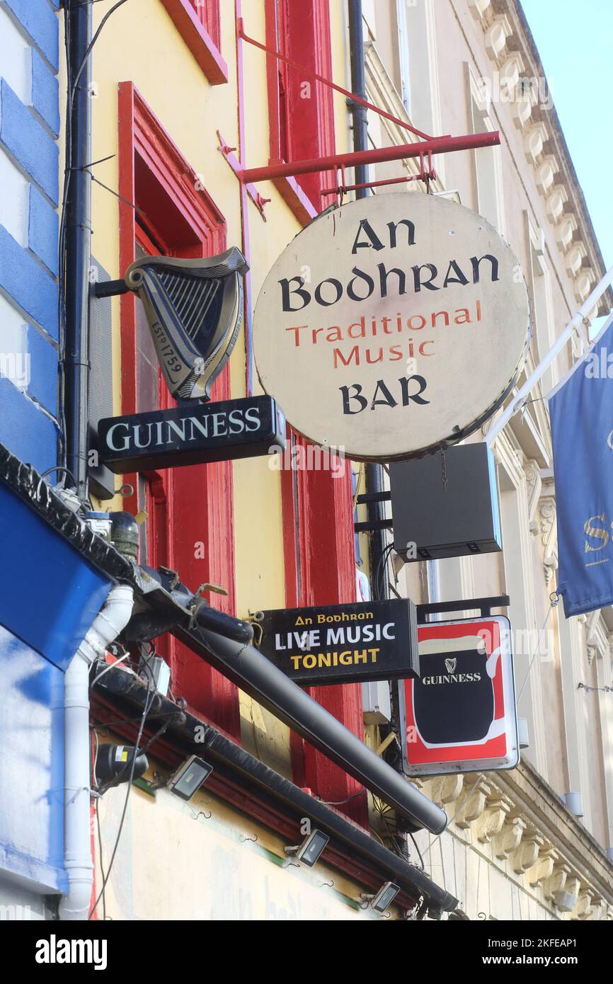 Irish pub signs on display above a pub in Ireland Stock Photo - Alamy