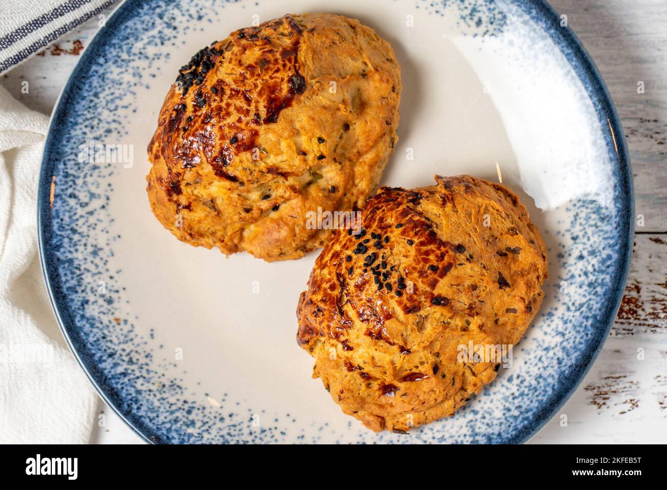 Pogaca with nigella sativa on a white background. Turkish pastry ...