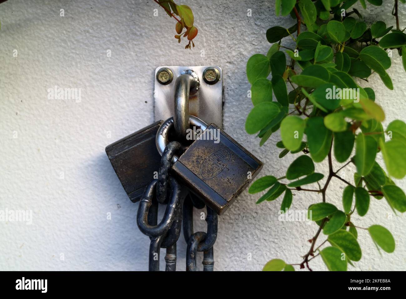 Two locks on old hi-res stock photography and images - Alamy