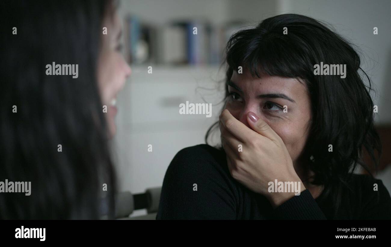 Friends sharing gossip whispering secret to woman ear telling SHOCKING ...