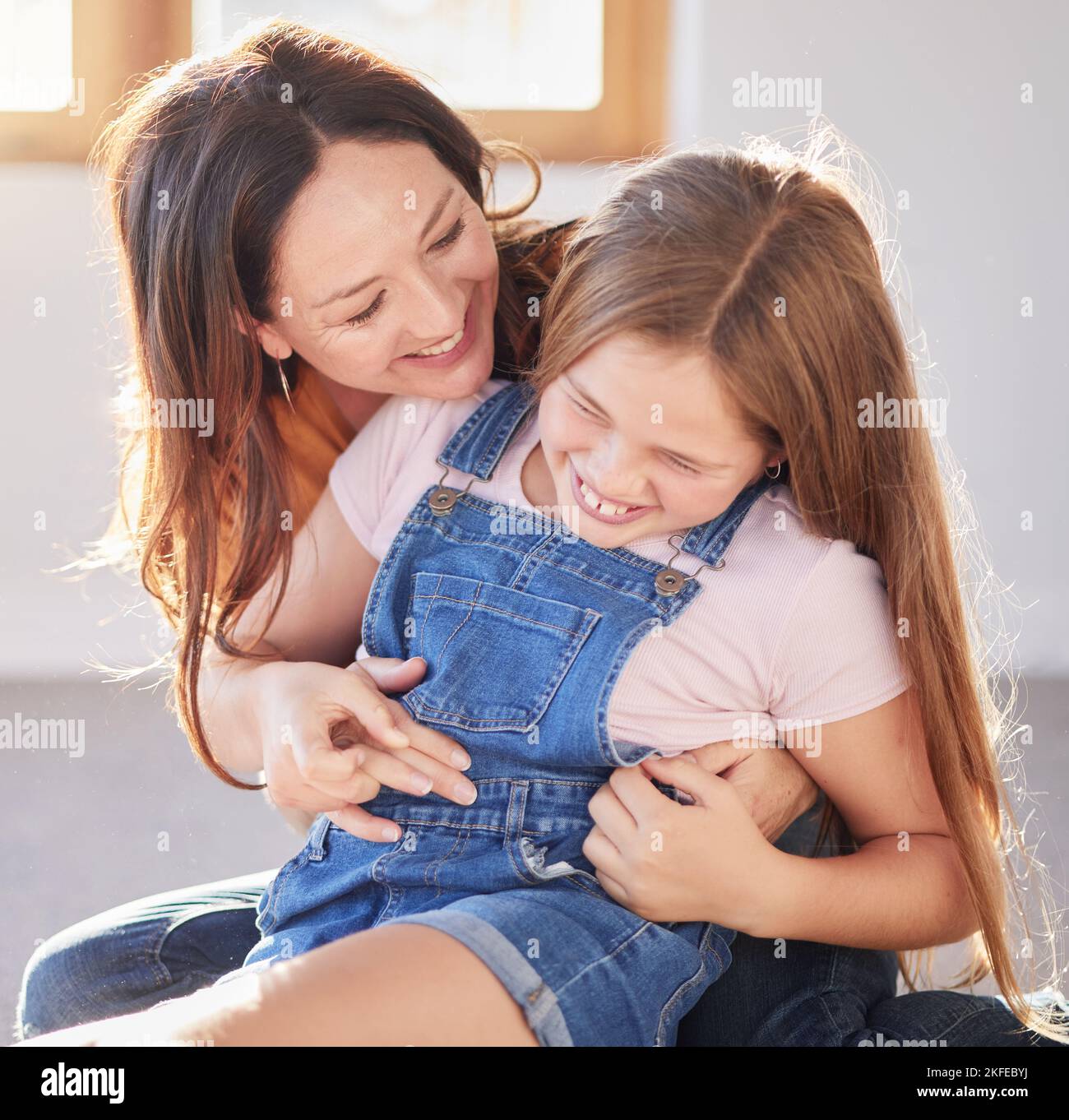 Happy, love and mother bonding with her child while playing, laughing ...
