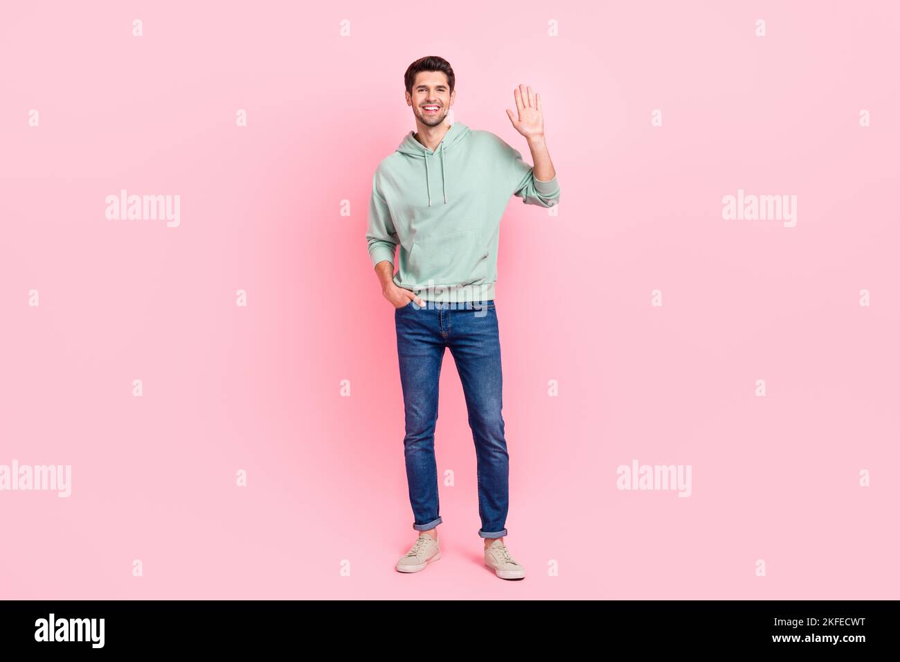 Full body portrait of satisfied young person arm palm waving hello hi ...