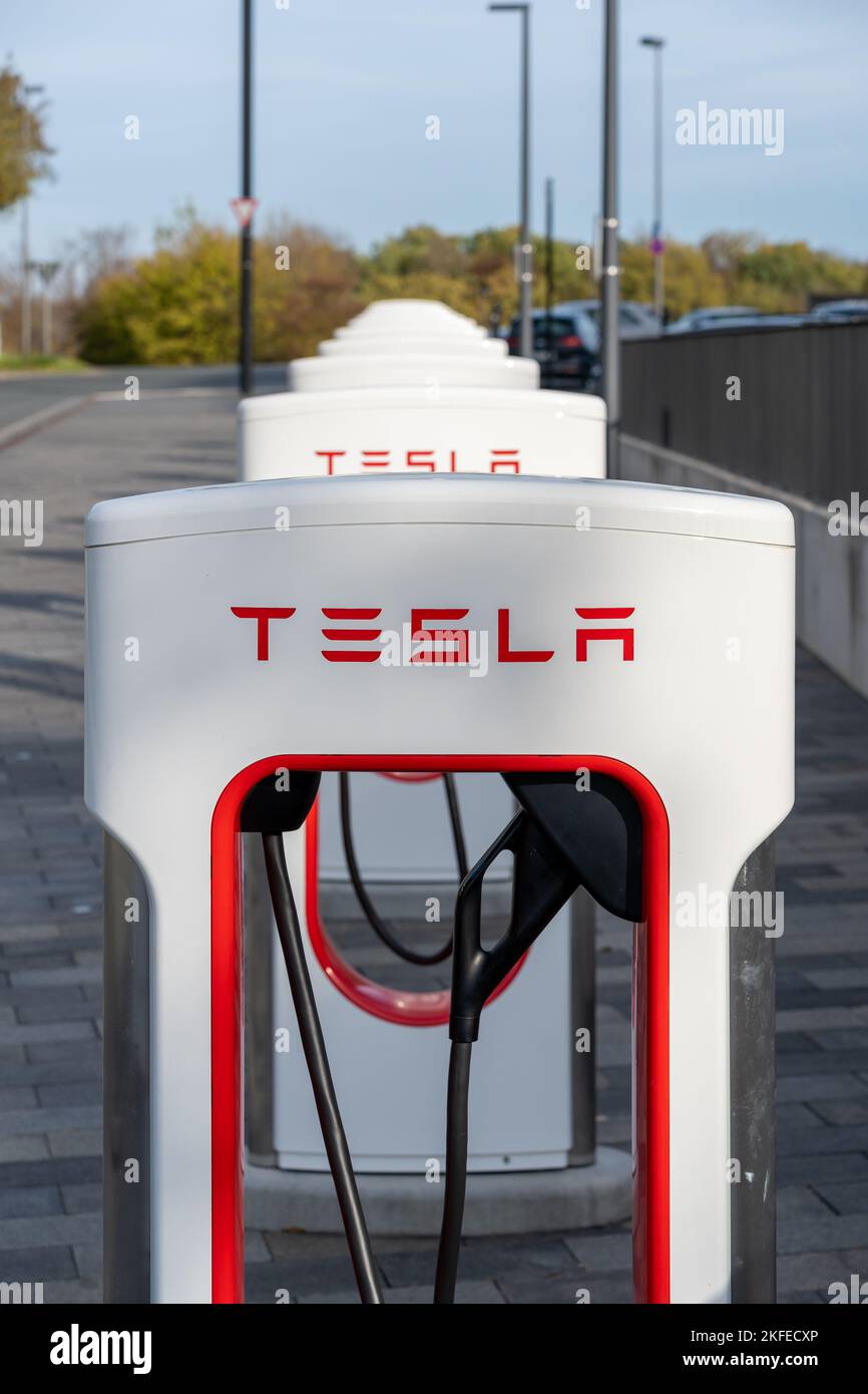 A row of the Tesla Superchargers for fast charging of electric Tesla ...
