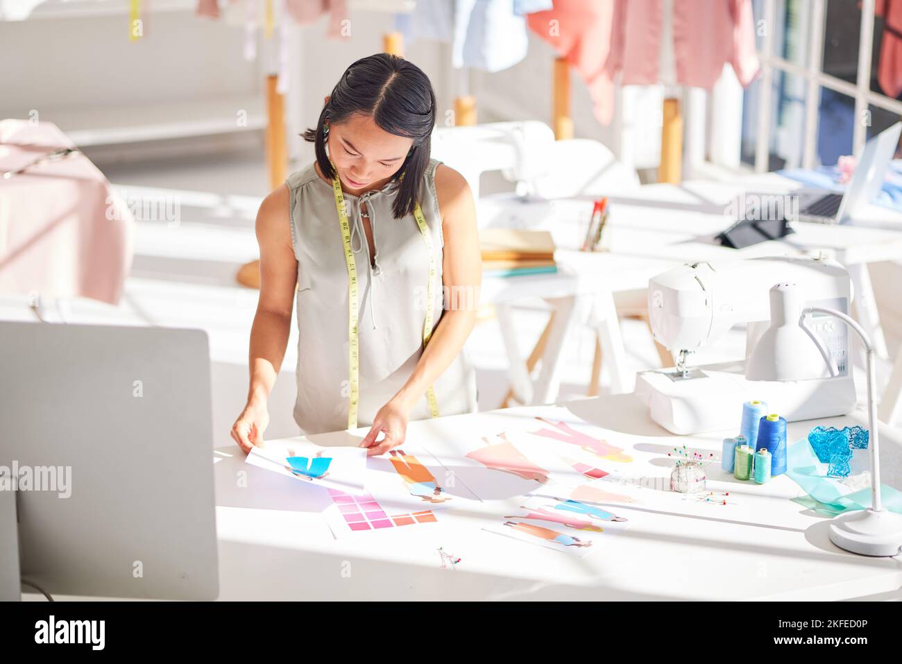 Fashion, designer and business woman working, thinking and planning ...