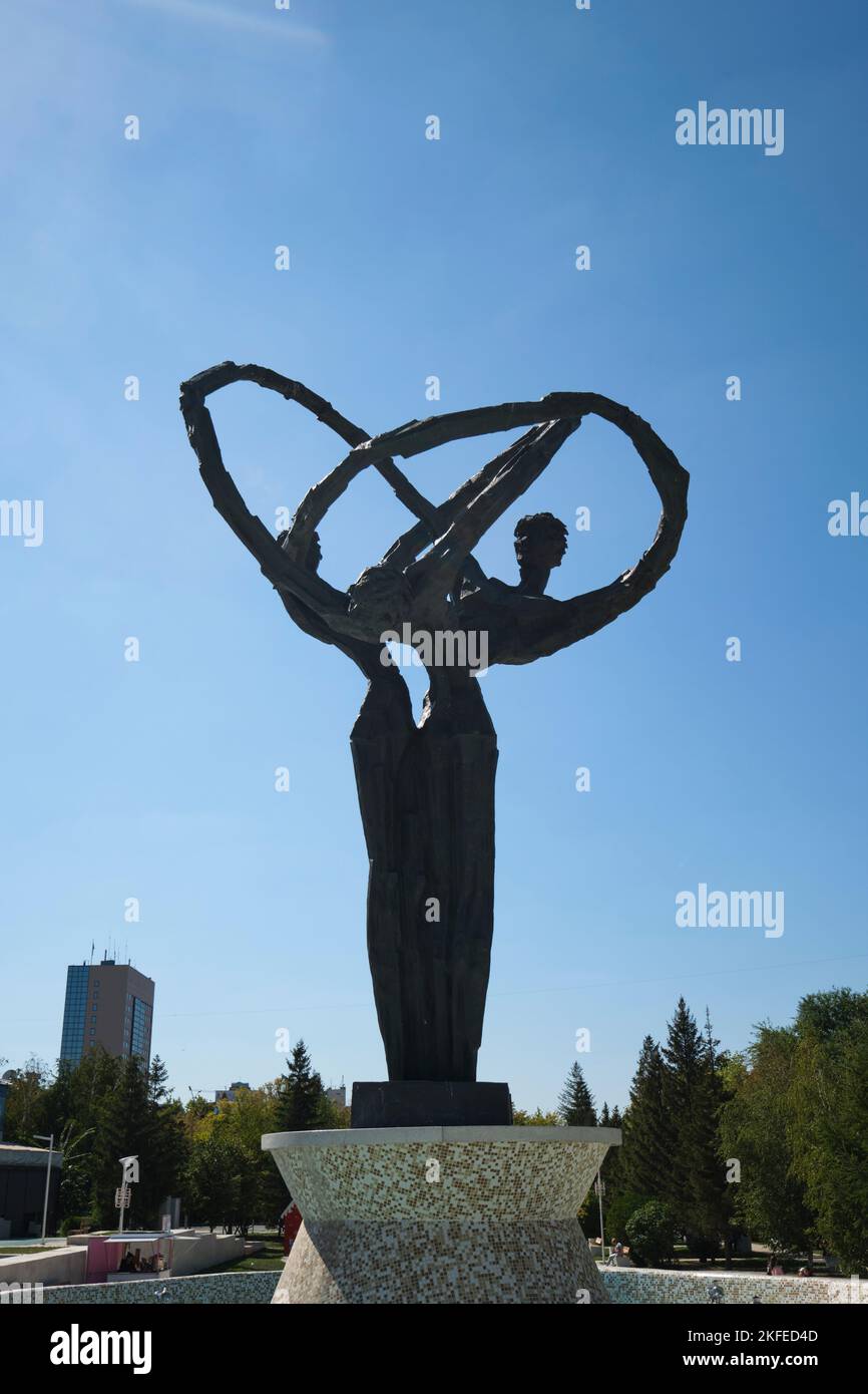 A view of the semi-abstract design of people with interwined arms. At ...