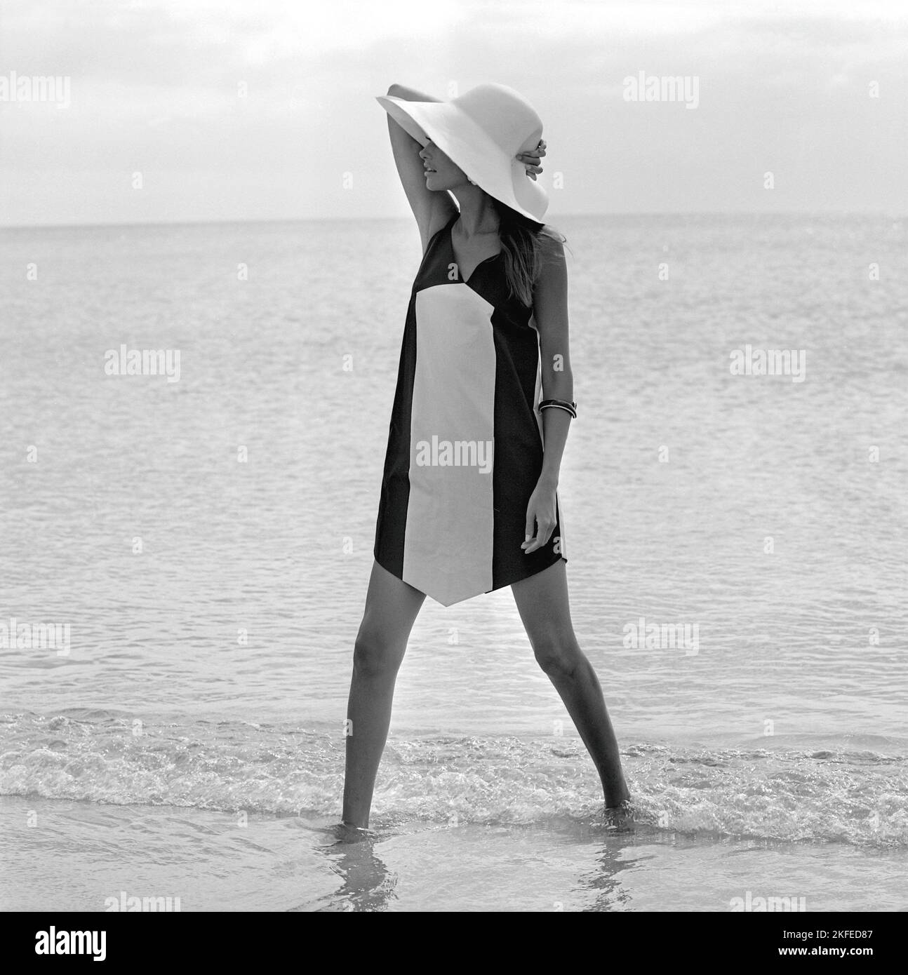 1960s model standing on beach hi-res stock photography and images - Alamy